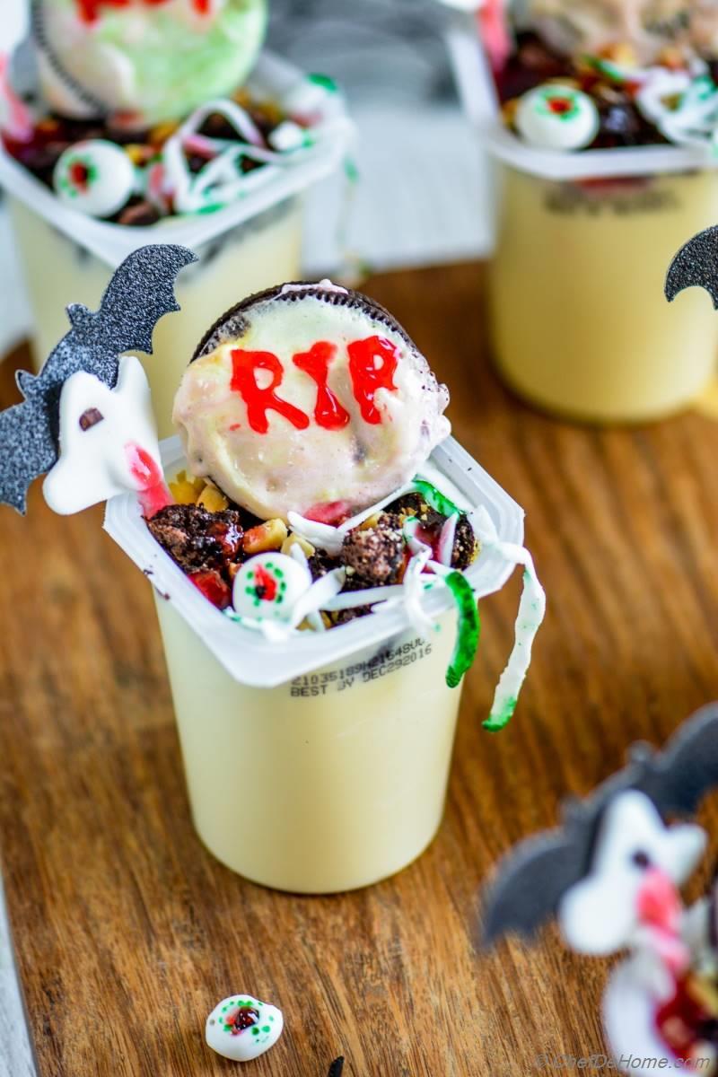 Witch House in Graveyard - Halloween Pudding Cups Recipe | ChefDeHome.com
